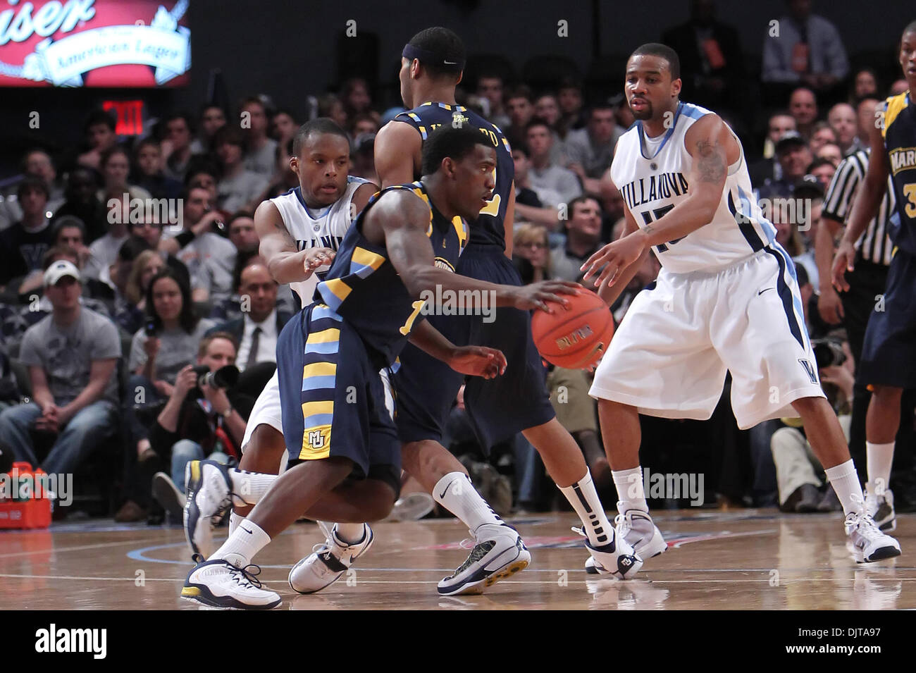 Marquette guard Darius Johnson-Odom #1 runs through. Marquette defeated ...