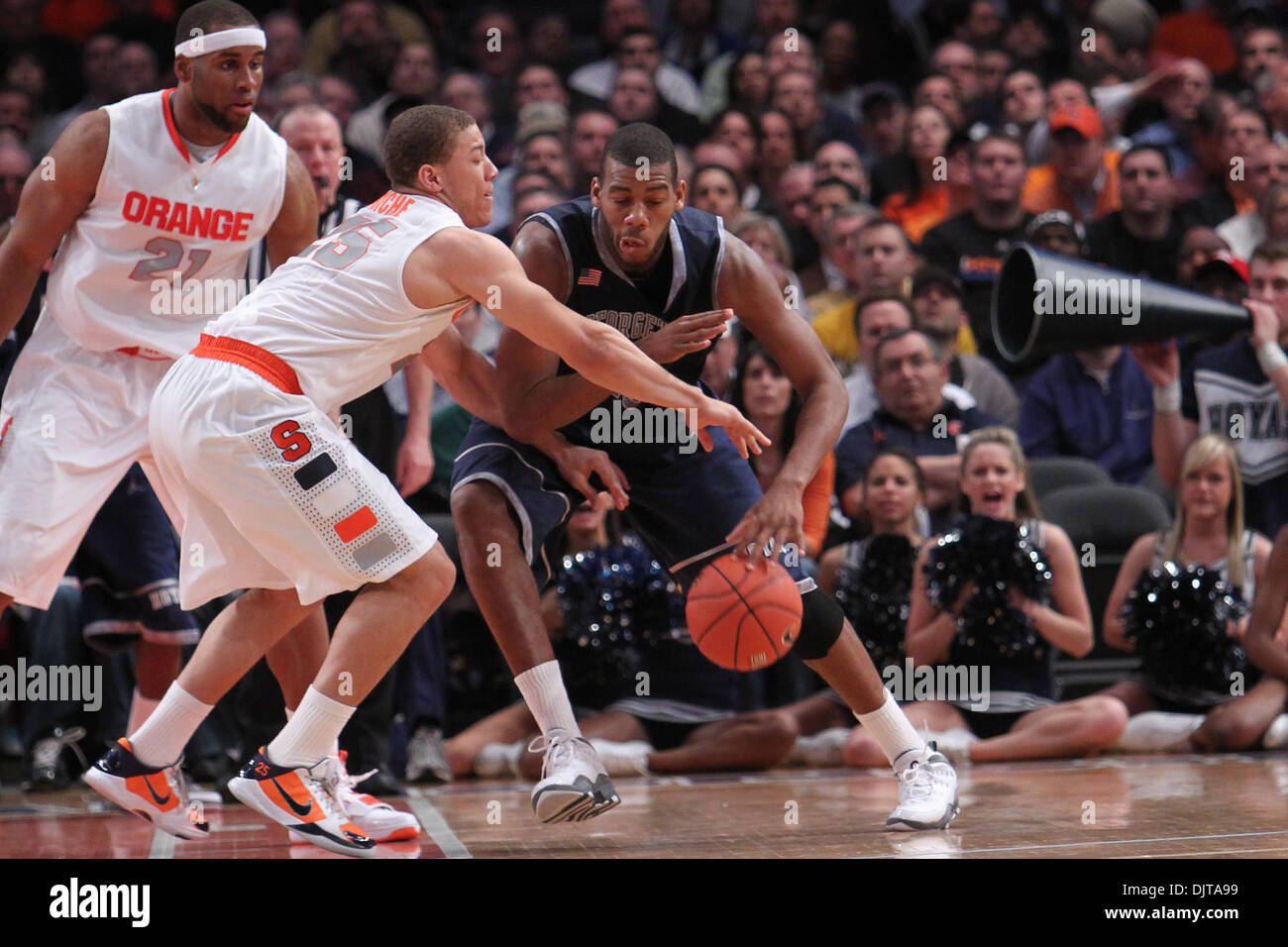 Georgetown center Greg Monroe #10 battles Georgetown guard Stephen ...