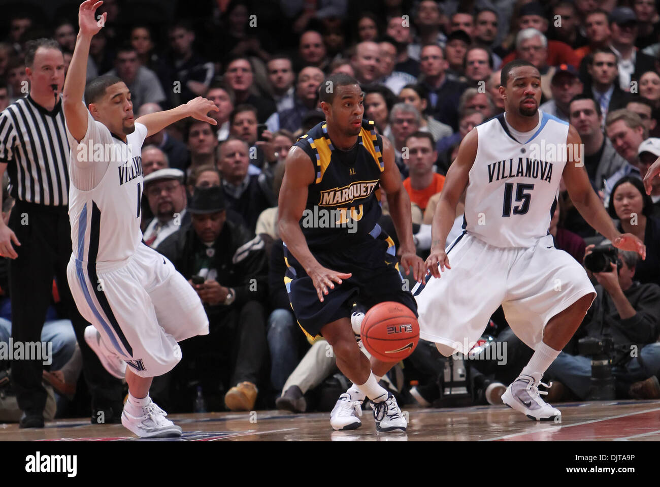Marquette guard David Cubillan #10 with an upcourt run as Villanova ...