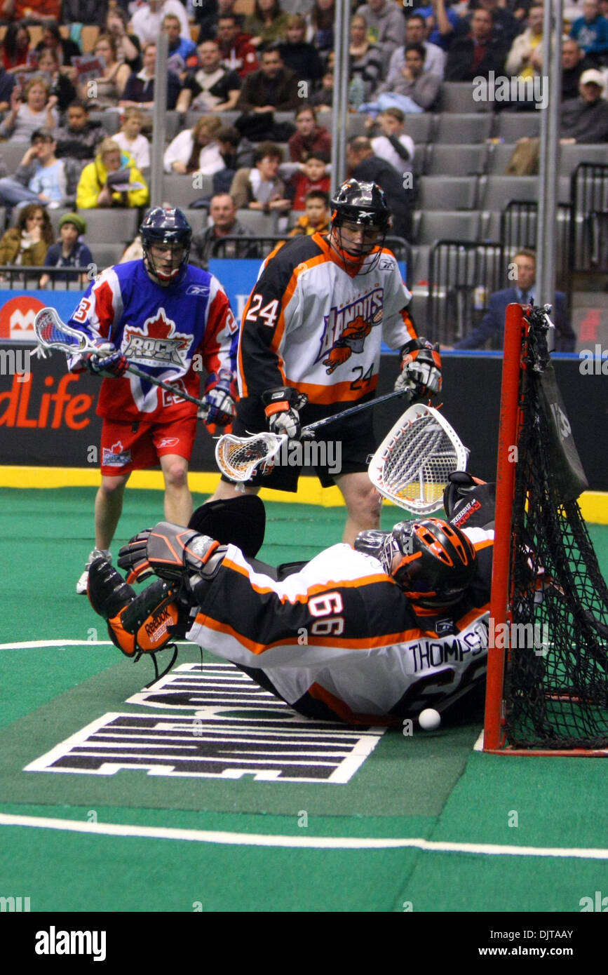 Buffalo Bandits goalie Michael Thompson (66) saves a goal during a ...