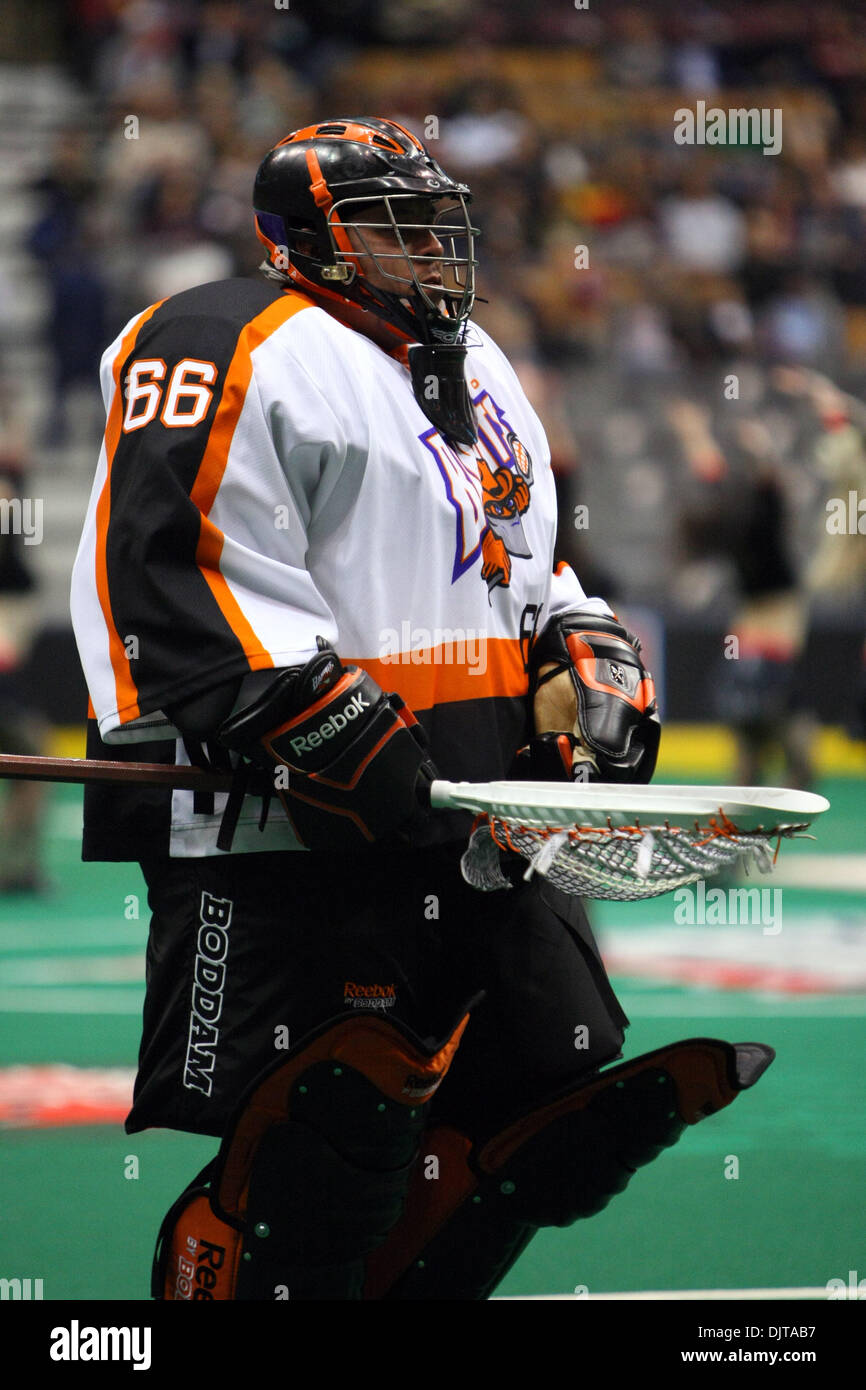 Buffalo Bandits goalie Michael Thompson (66) looks on during a pause in ...