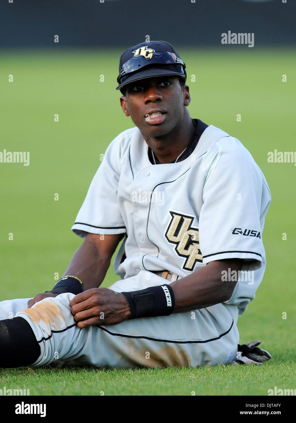 Central Florida Knight shortstop Darnell Sweeney stretches before game ...