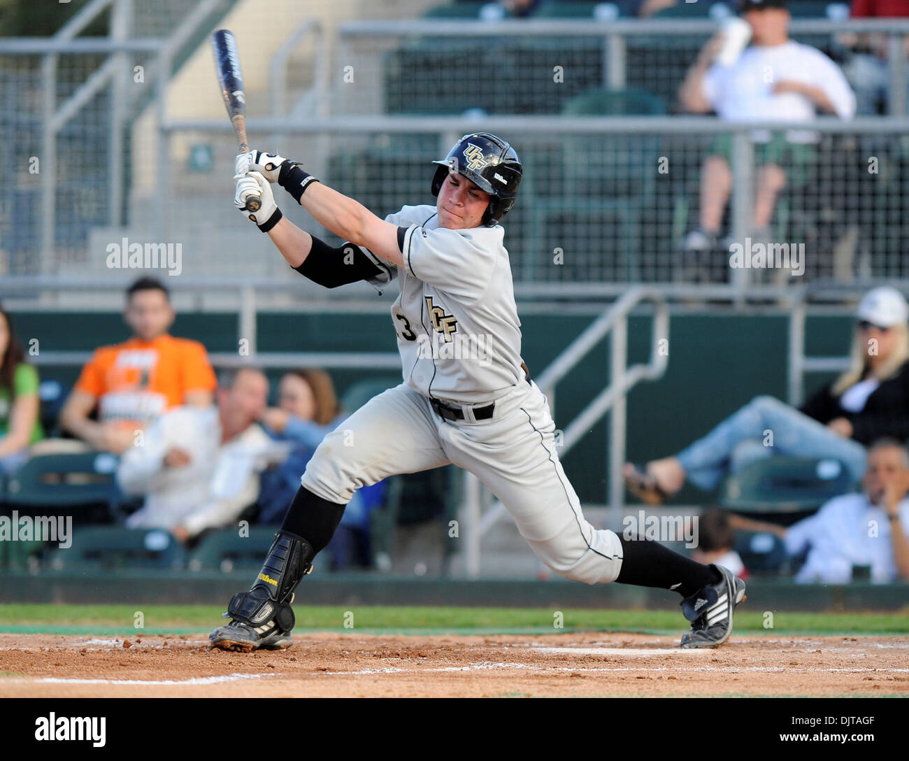 Central Florida Knights catcher Beau Taylor lunges at a pitch..The ...