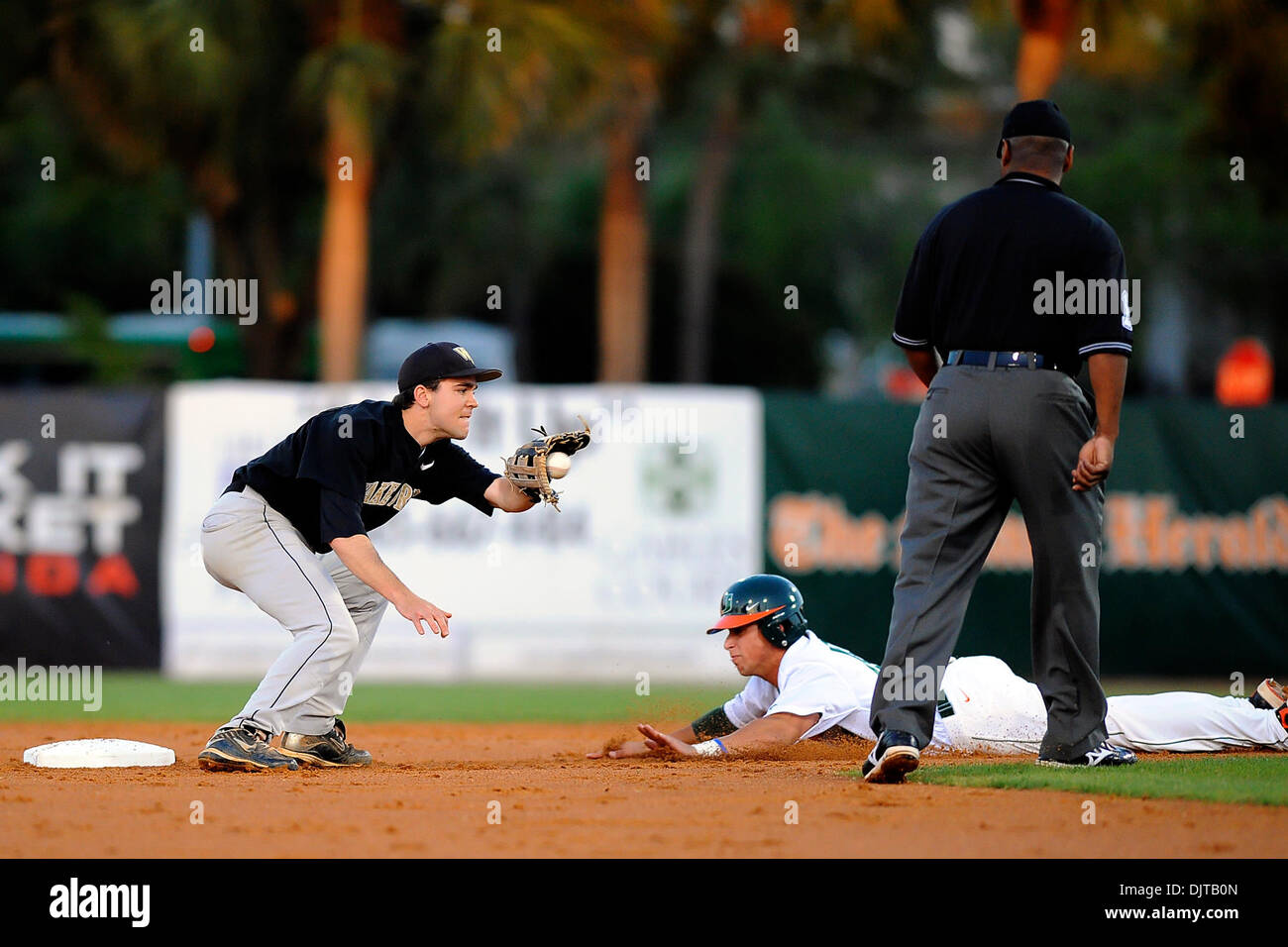 Wake Forest Demon Deacons 2nd baseman Mark Rhine tags out Nathan ...