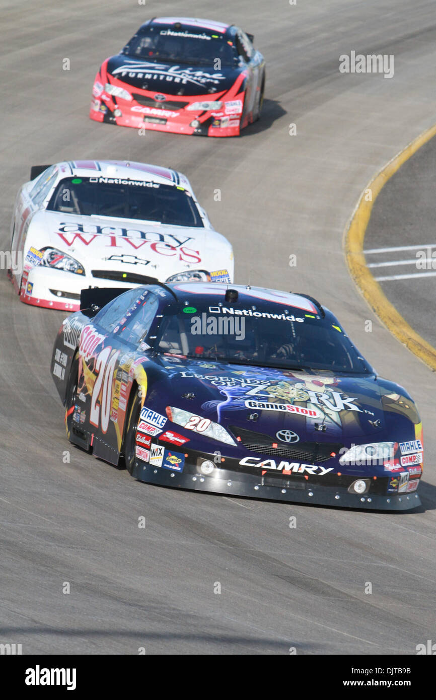 Nationwide drivers Joey Logano #20, Scott Wimmer #7, and Kyle Busch #18 ...