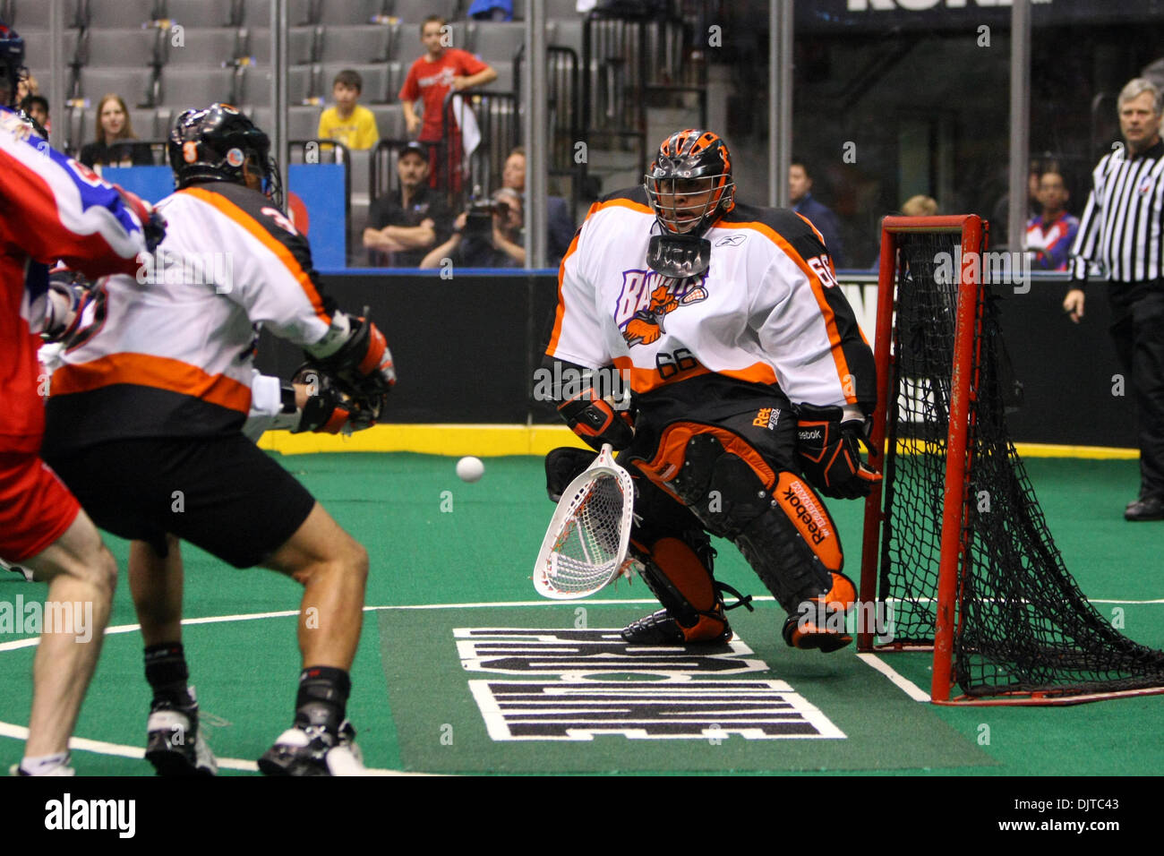 Buffalo Bandits goaltender Michael Thompson (66) saves a goal during a ...