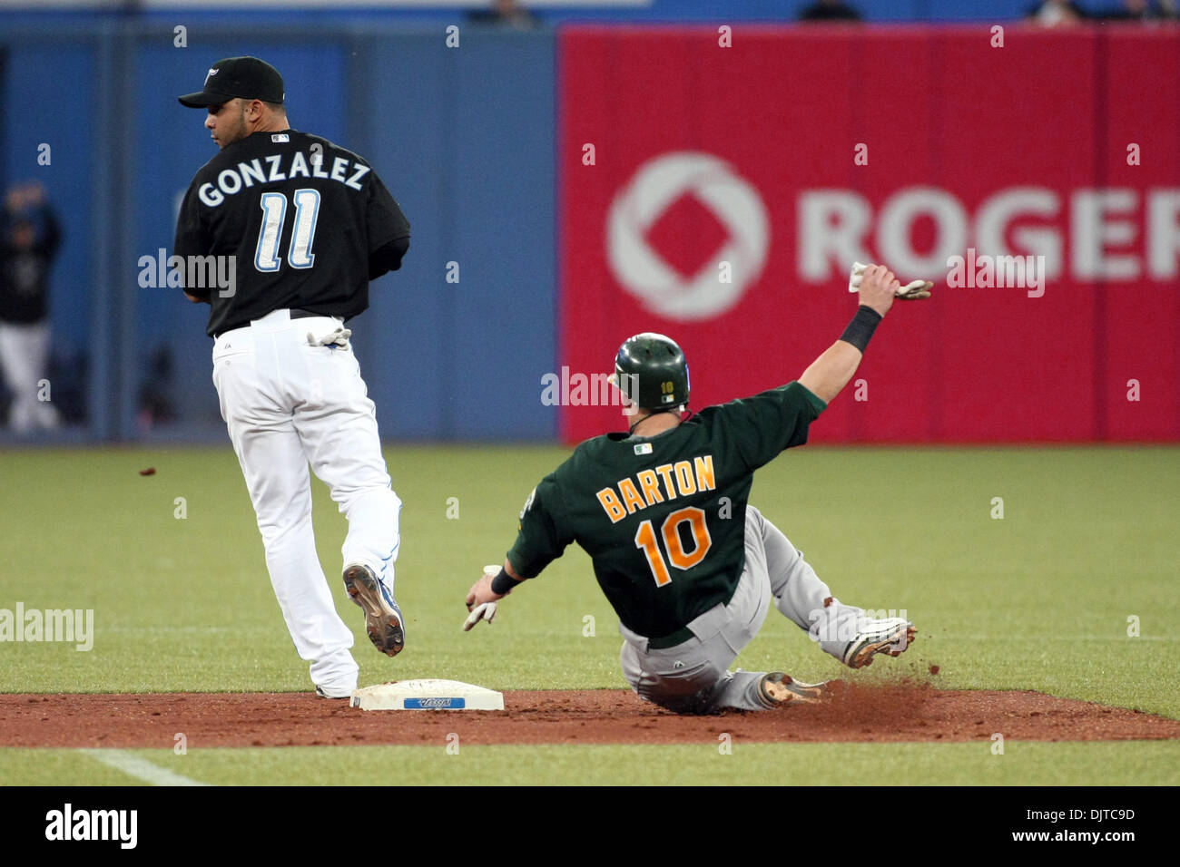 Oakland Athletics first baseman Daric Barton (10) slides into second ...