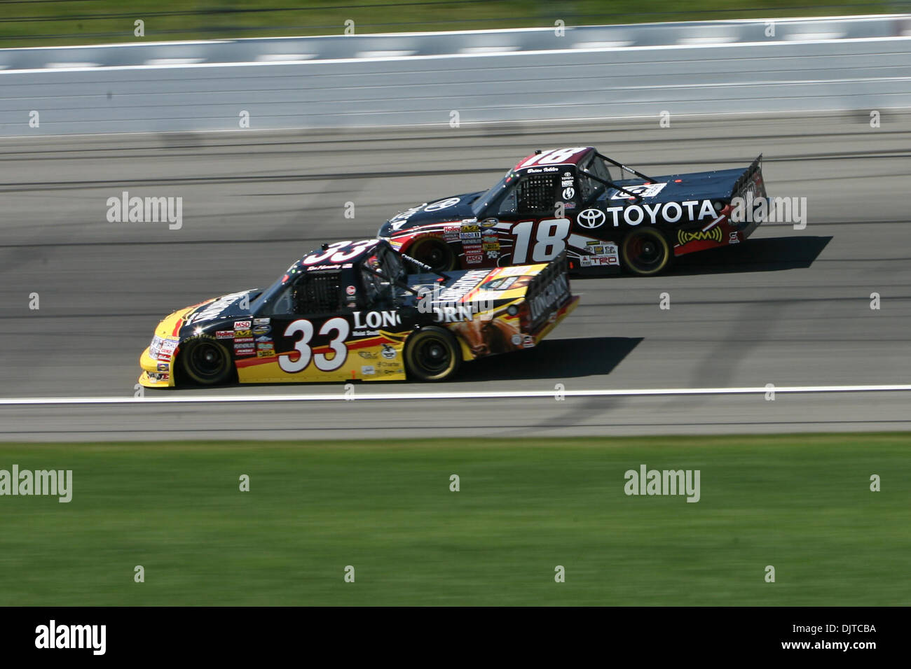 02 May 2010: Ron Hornaday #33 and Brian Ickler #18 race for position ...