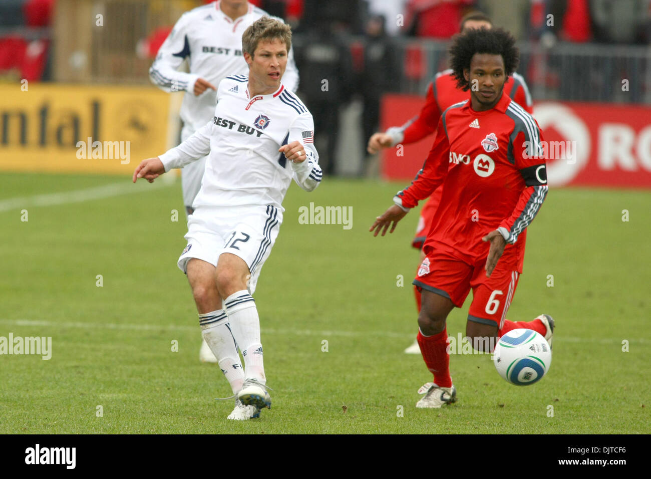 Chicago Fire midfielder Logan Pause (12) and Toronto FC midfielder ...