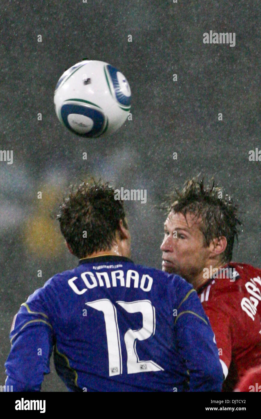 15 May 2010: Jimmy Conrad (#12) and Brian McBride (#20) take to the air ...