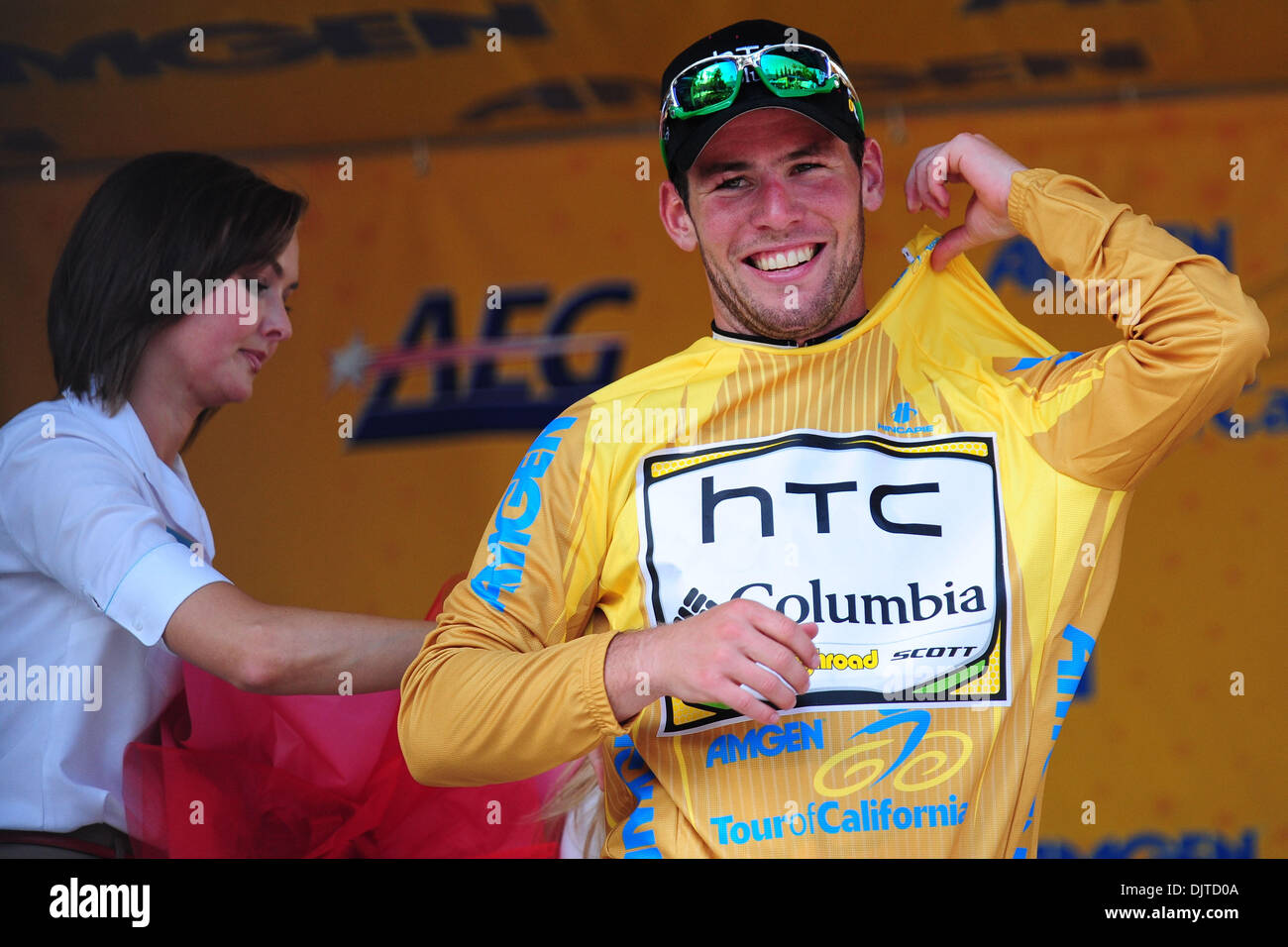 Mark Cavendish of Team HTC-Columbia is all smiles as he dons the race ...