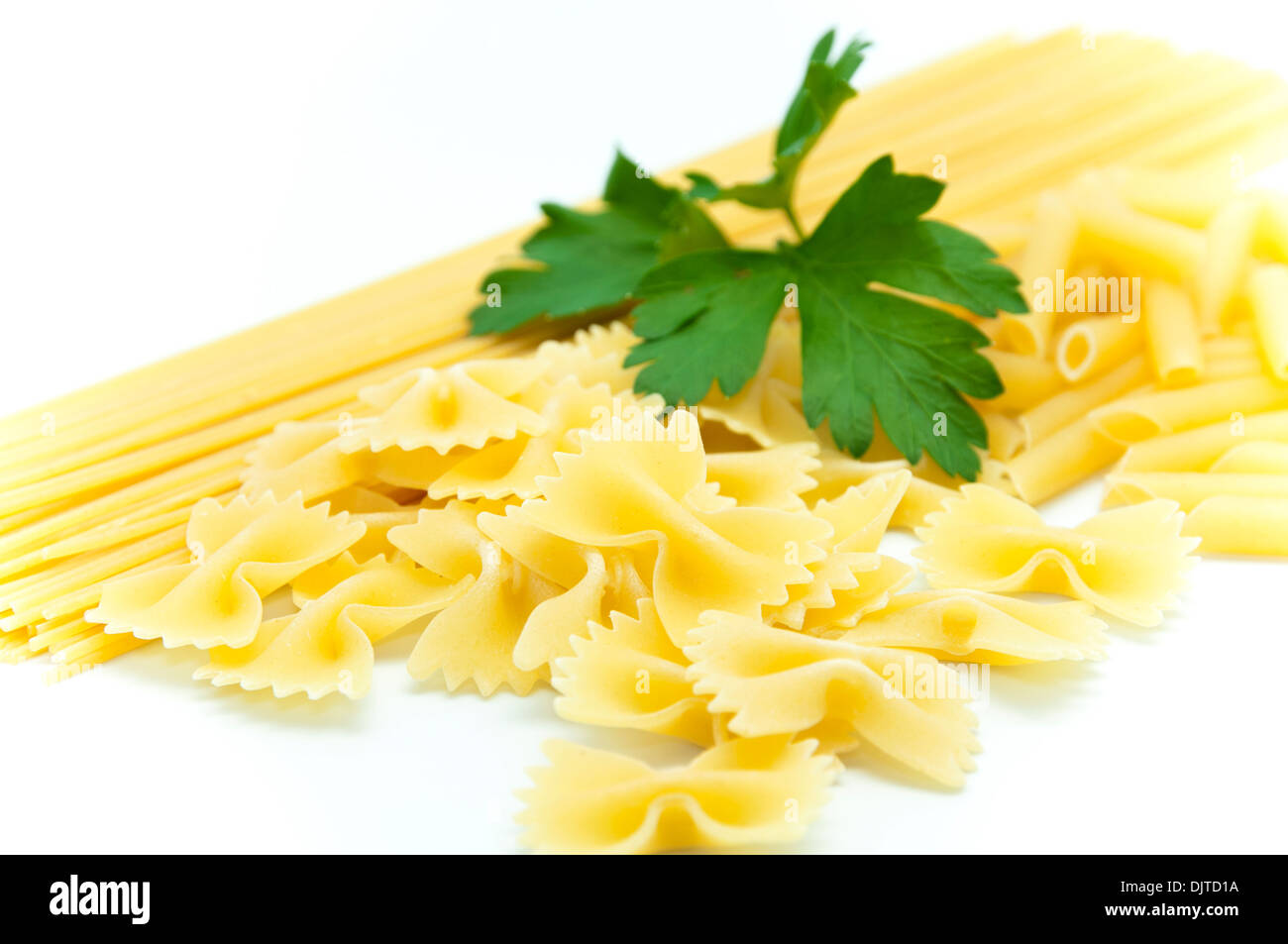 Italian pasta on a white background Stock Photo - Alamy