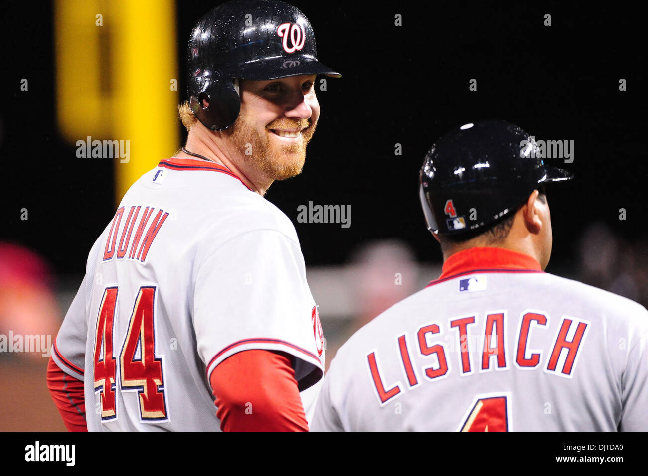 San Francisco, CA: Washington Nationals Adam Dunn (44) enjoys a lighter ...