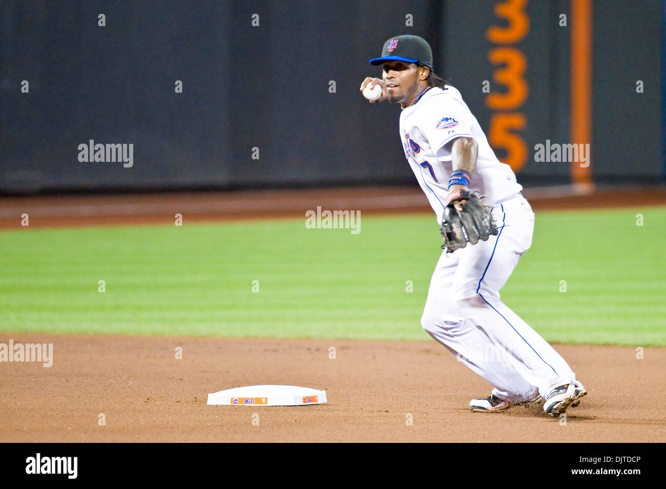 Mets shortstop Jose Reyes #7 turns a double play during the game between the Philadelphia ...