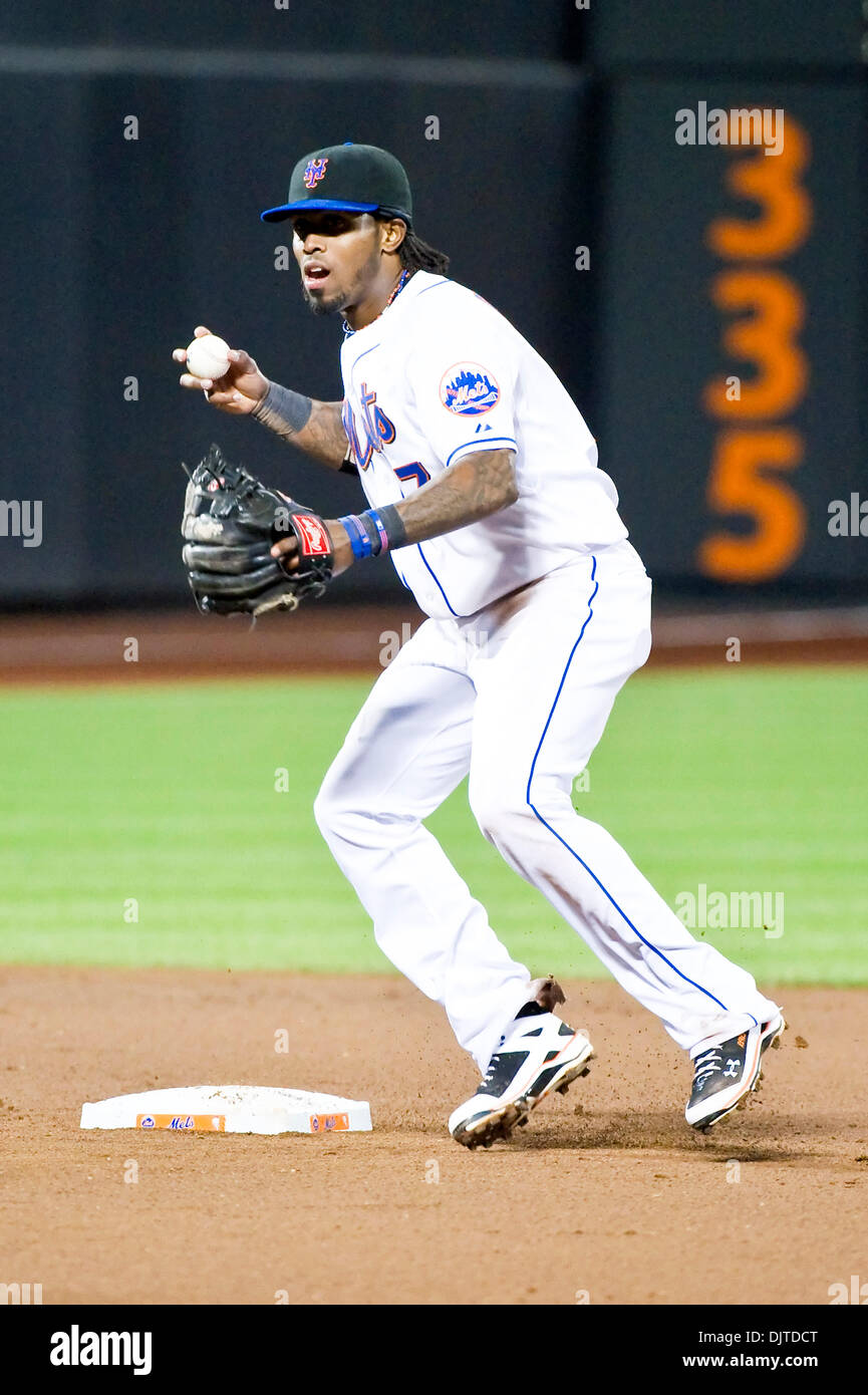 Mets shortstop Jose Reyes #7 turns a double play during the game ...