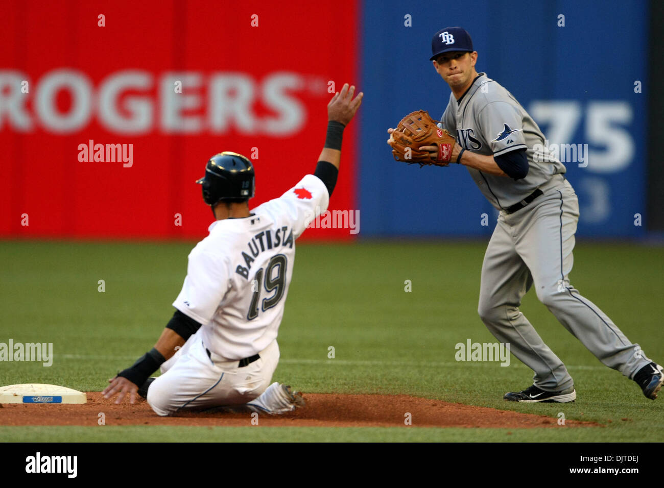 Toronto Blue Jays third baseman Jose Bautista (19) slides into second ...