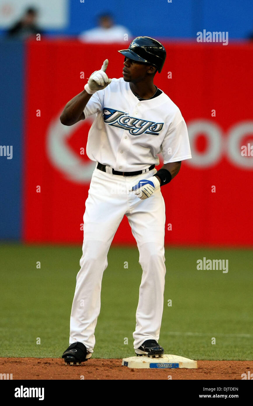 Toronto Blue Jays left fielder Fred Lewis (15) reacts after making it ...