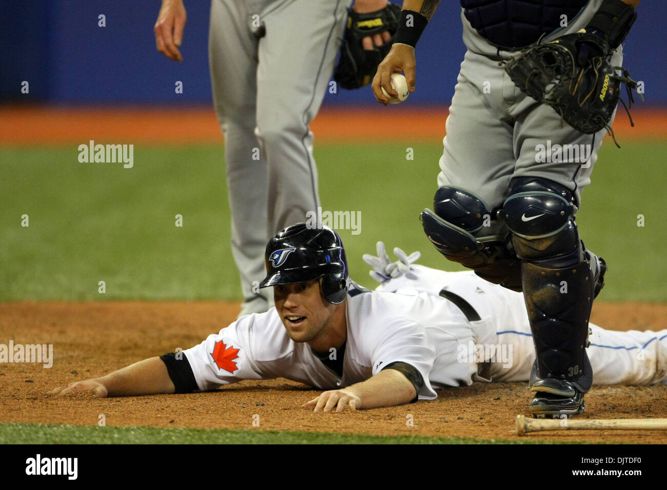 Toronto Blue Jays second baseman Aaron Hill (2) is on the ground after ...