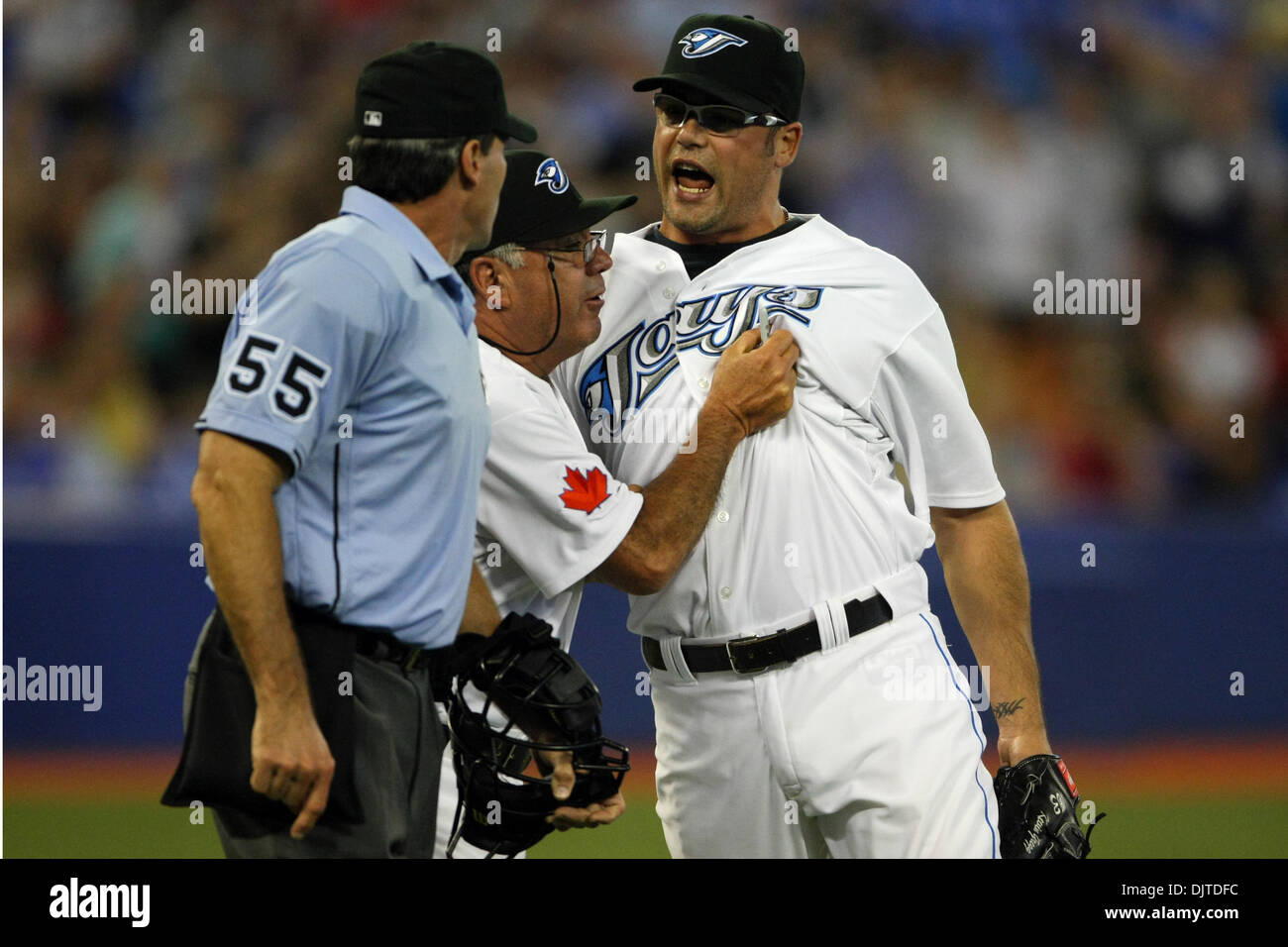 Toronto Blue Jays relief pitcher Kevin Gregg (63) is thrown out by ...