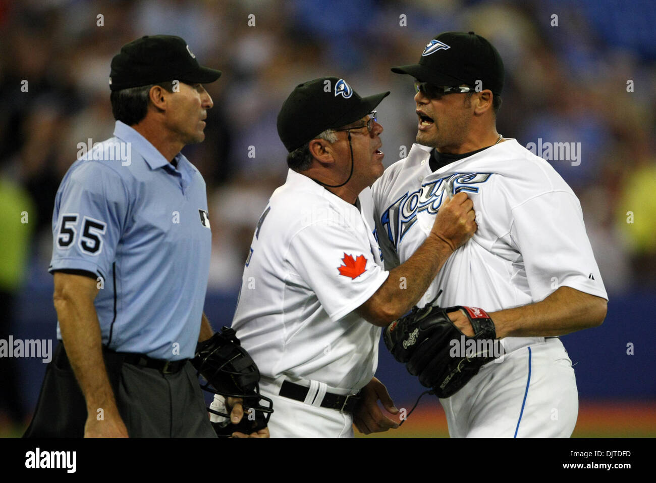 Toronto Blue Jays relief pitcher Kevin Gregg (63) is thrown out by ...