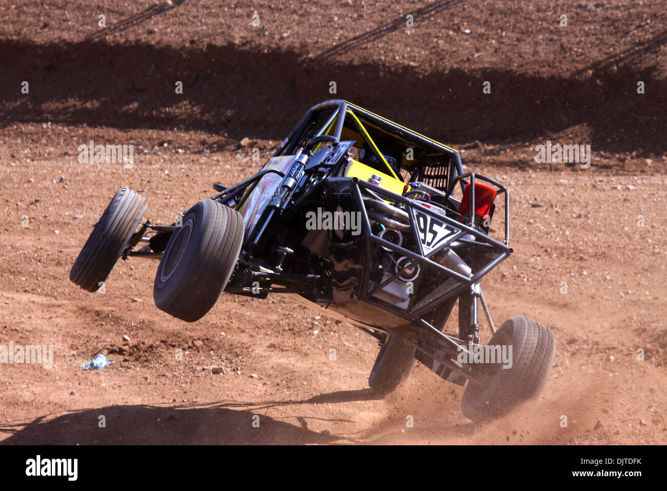 March 5, 2010 Chuck Cheek corners on two wheel during practice at the ...
