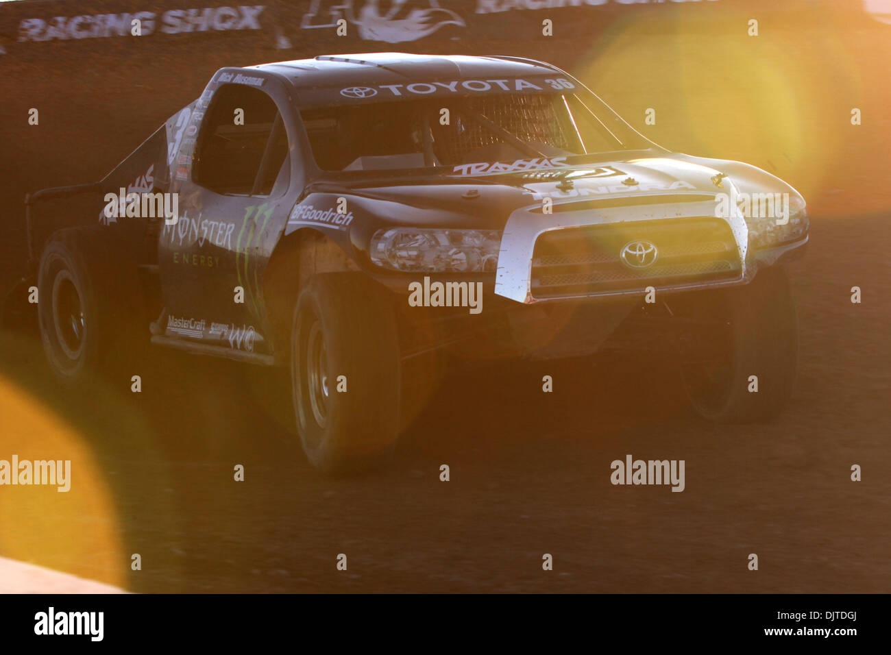 March 5, 2010, Rick Huseman #36 goes through turn 4 as the sun sets in ...