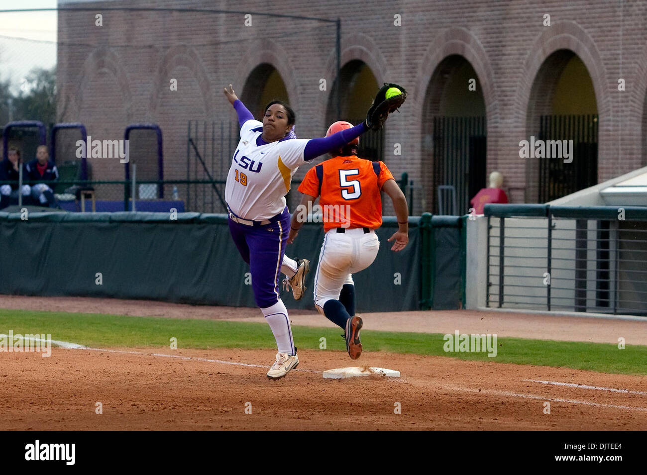 Syracuse University at LSU; LSU first baseman Anissa Young stretches to ...