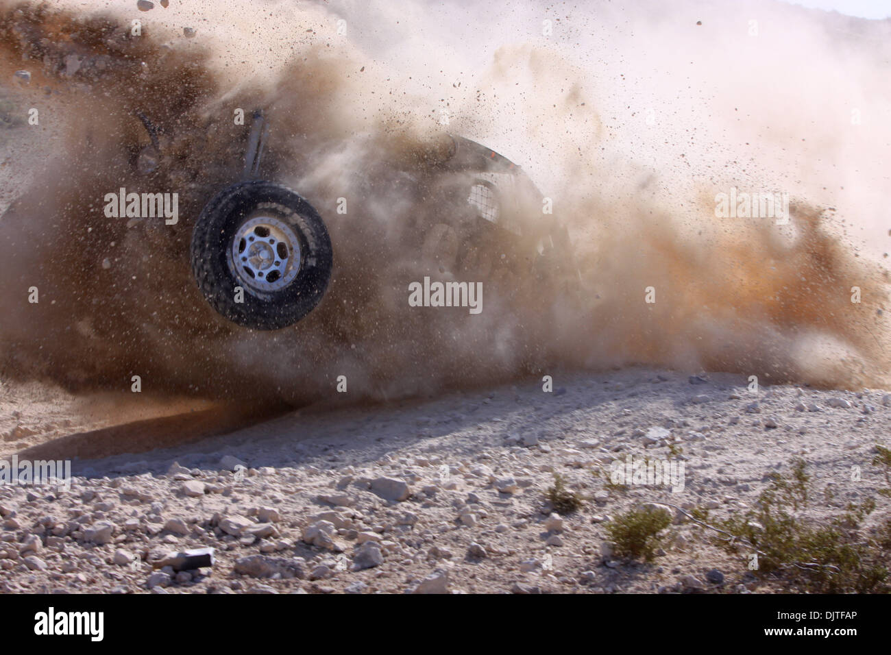 March 27, 2010 The Class 12 buggy of Zak Langley (#1203) explodes out ...
