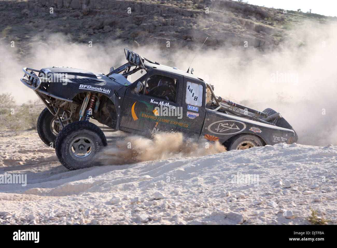 March 27, 2010 1450 truck class winner Kevin McMurray (#1418) emerges ...
