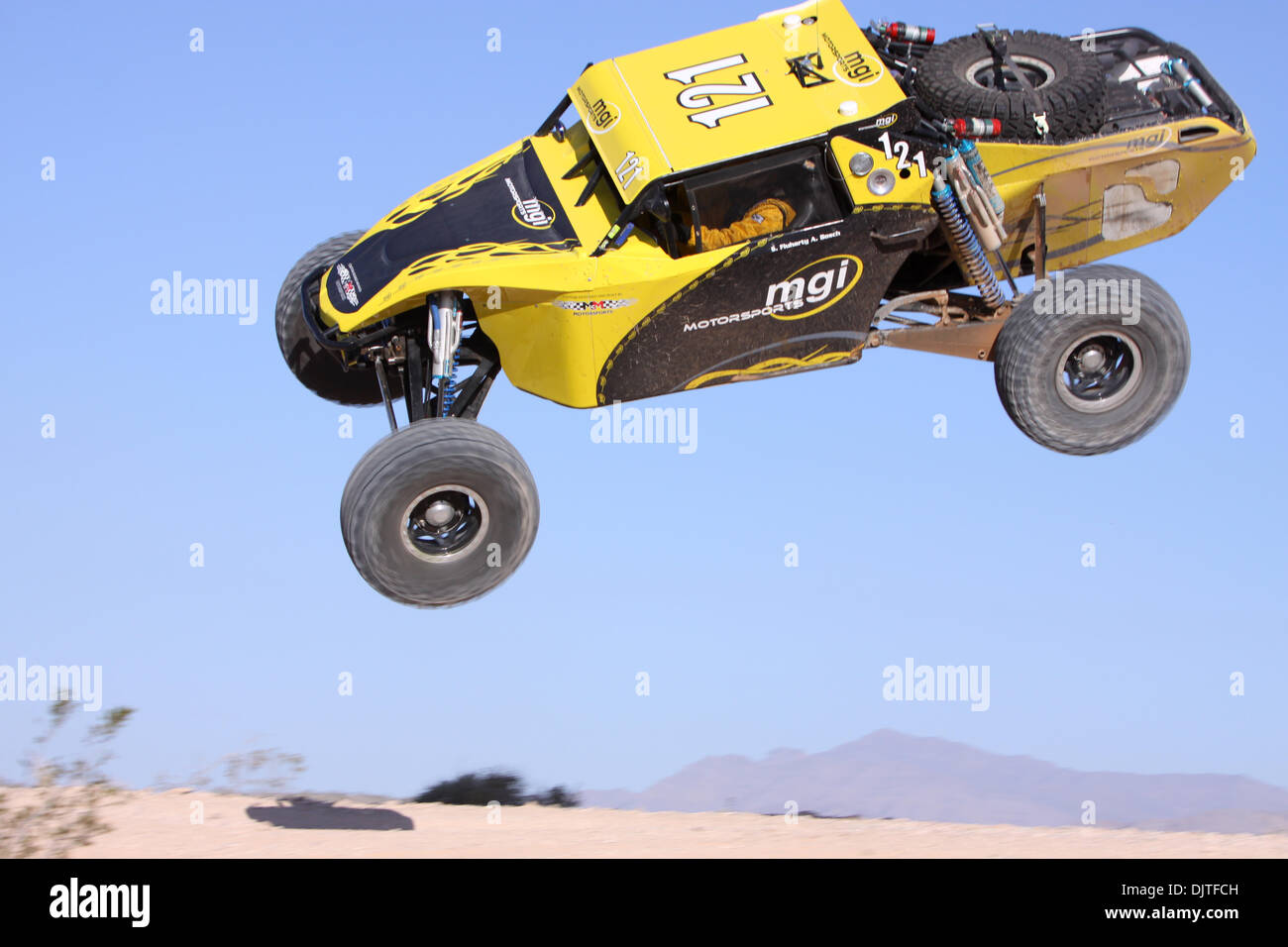 March 27, 2010 Adam Bosch (#121) flies through the air and then lands ...