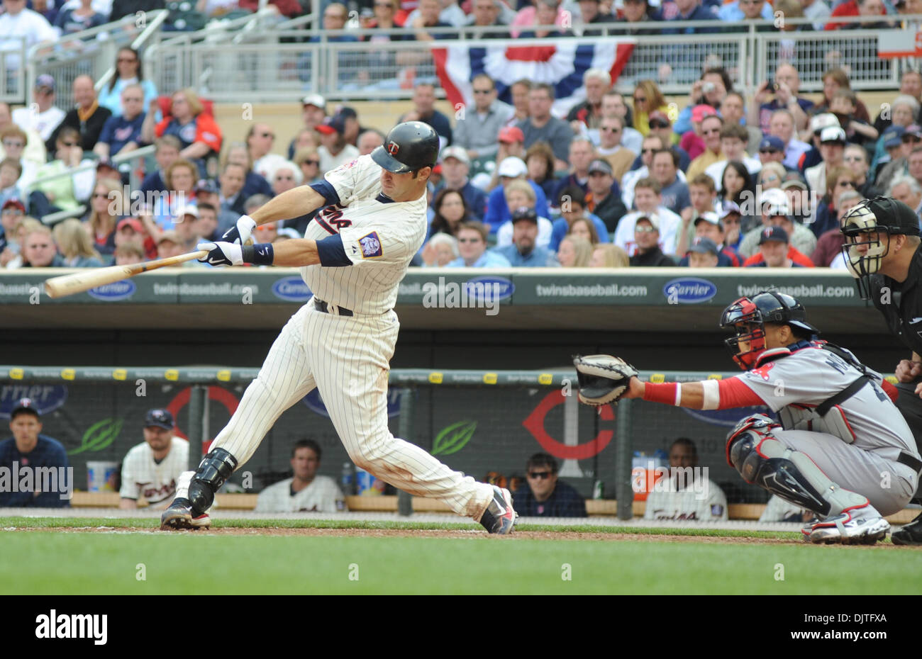 Minnesota Twins catcher Joe Mauer #7 fouls off a pitch in the bottom of ...