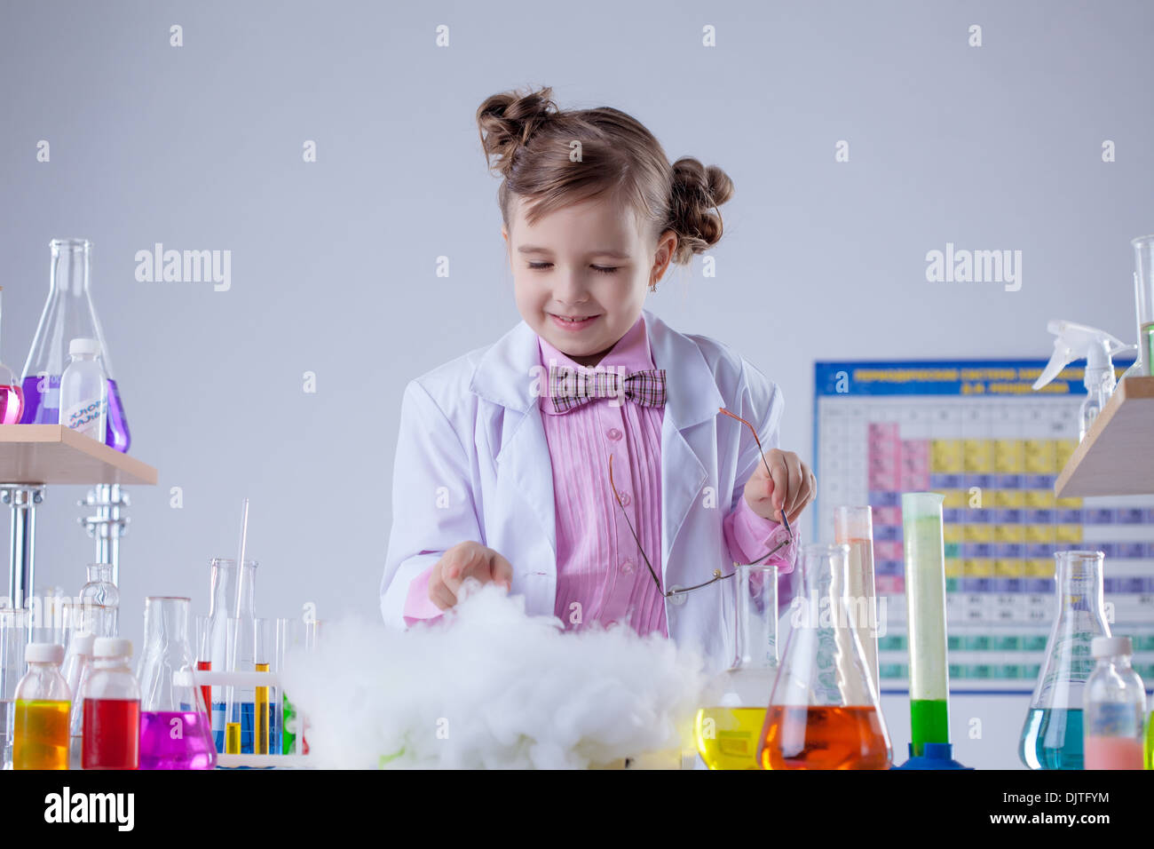 Smiling chemist successfully conducted experiment Stock Photo - Alamy