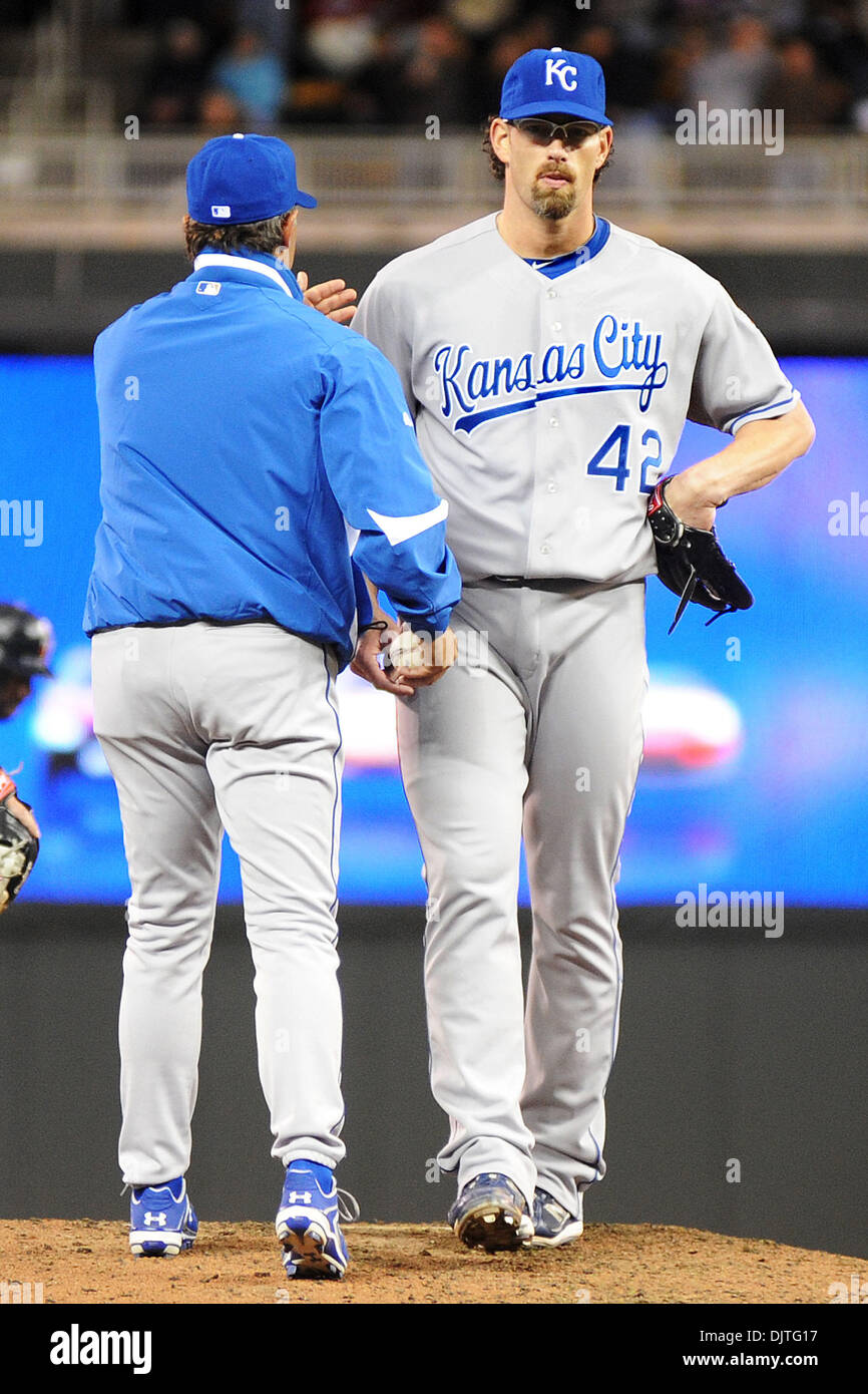 Kansas City Royals Manager Trey Hillman brings Hughes (not shown) in ...