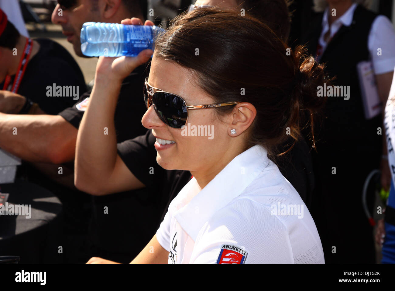 Go-Daddy.com driver Danica Patrick signs autographs in the paddock at ...