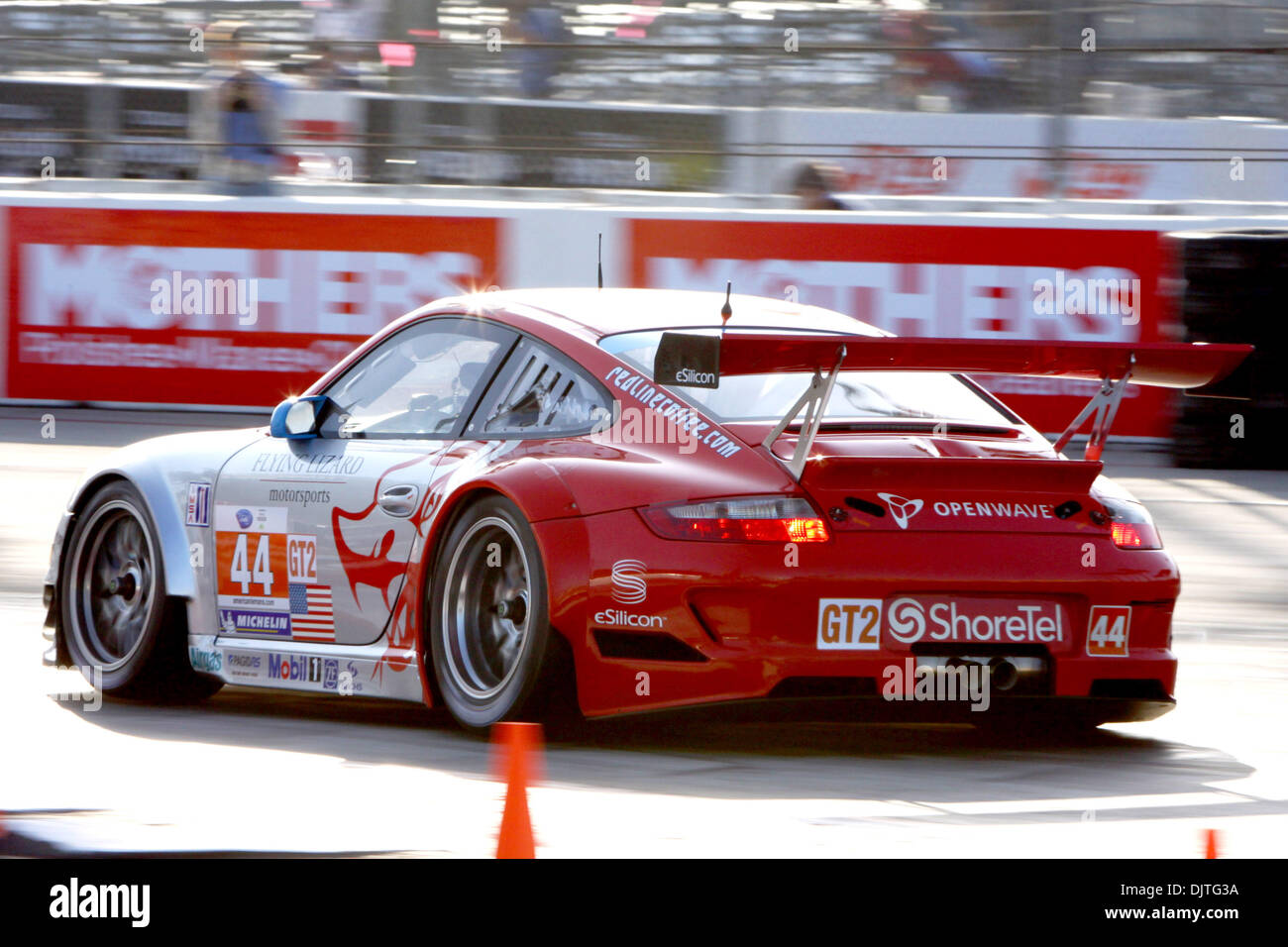 The number 44 Porsche Driven by Darren Law heads into turn 11 during ...