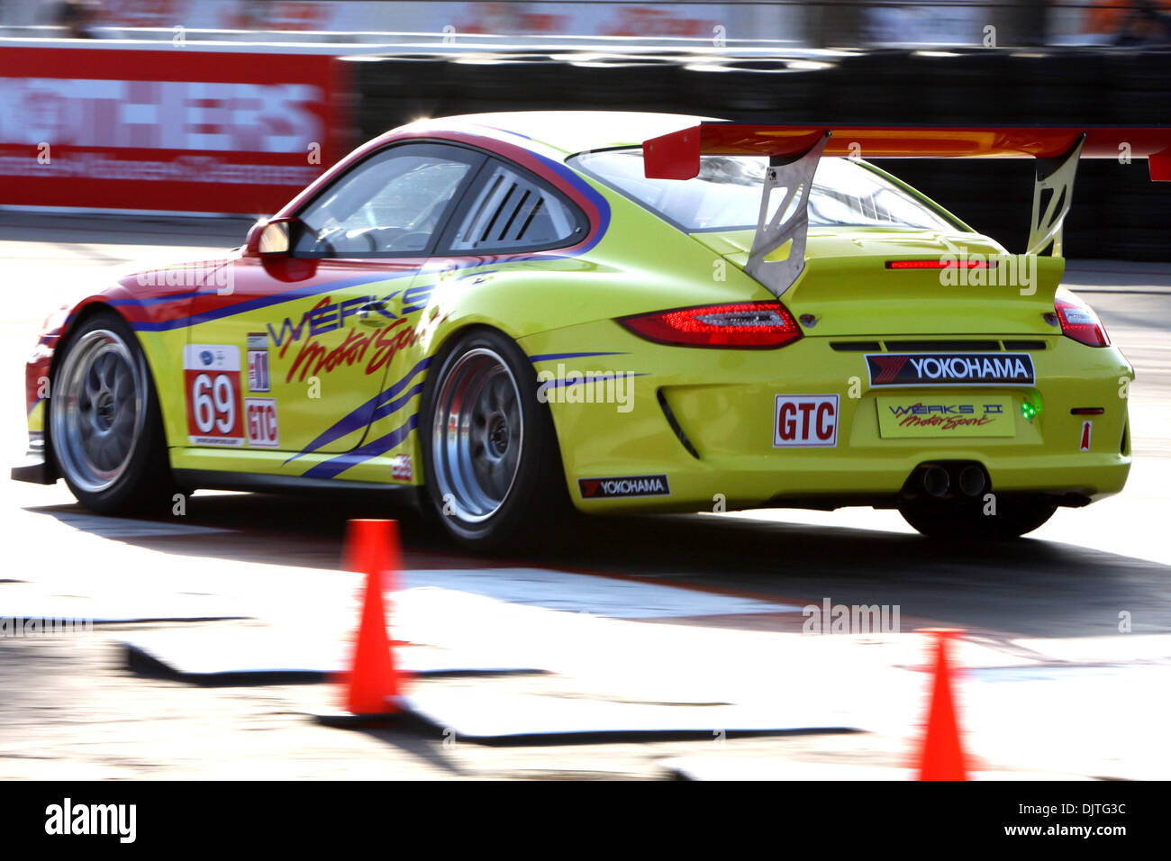 The number 69 Porsche Driven by Robert Rodriguez heads into turn 11 ...