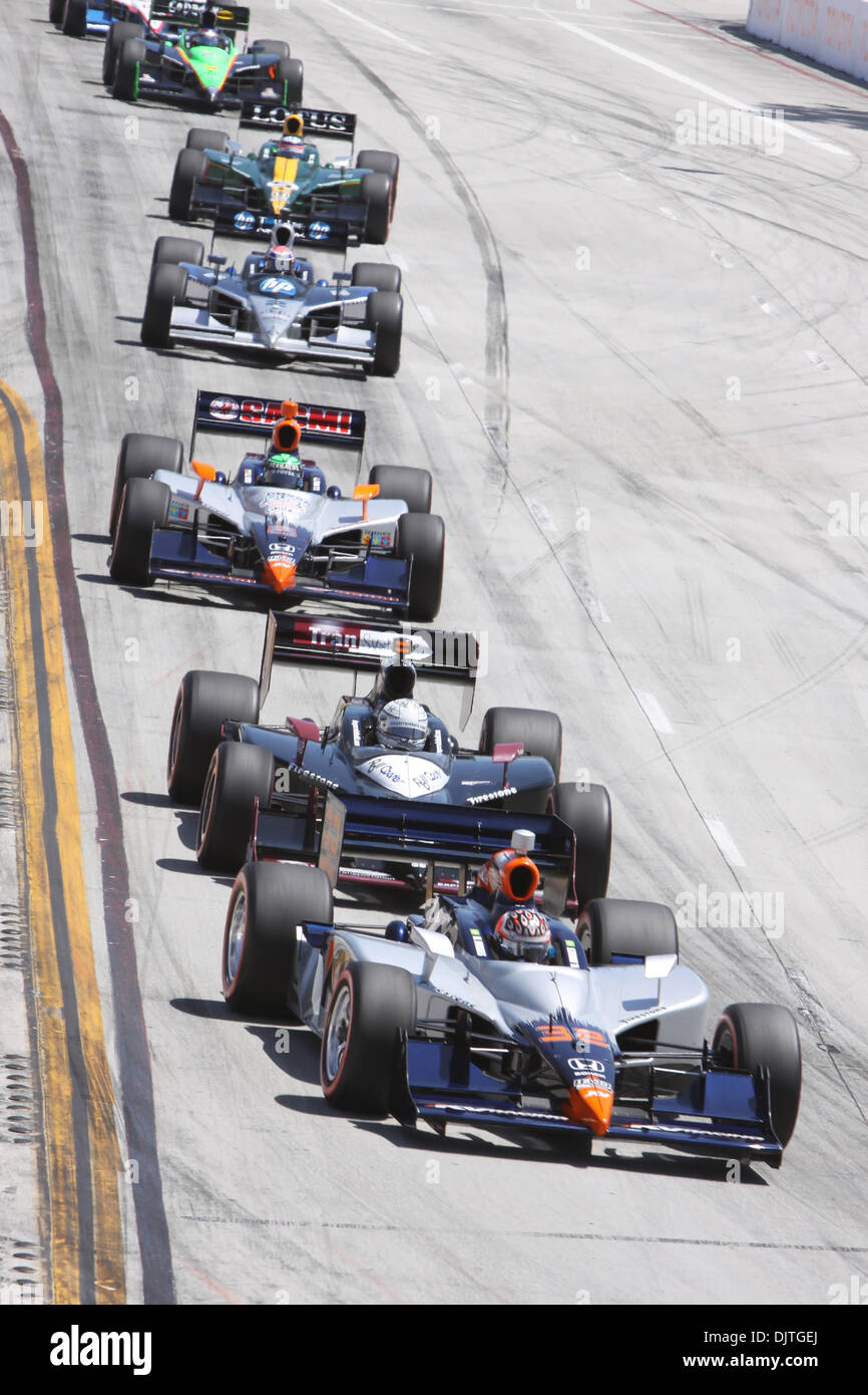 The IRL field comes down the main strait under caution before the start ...