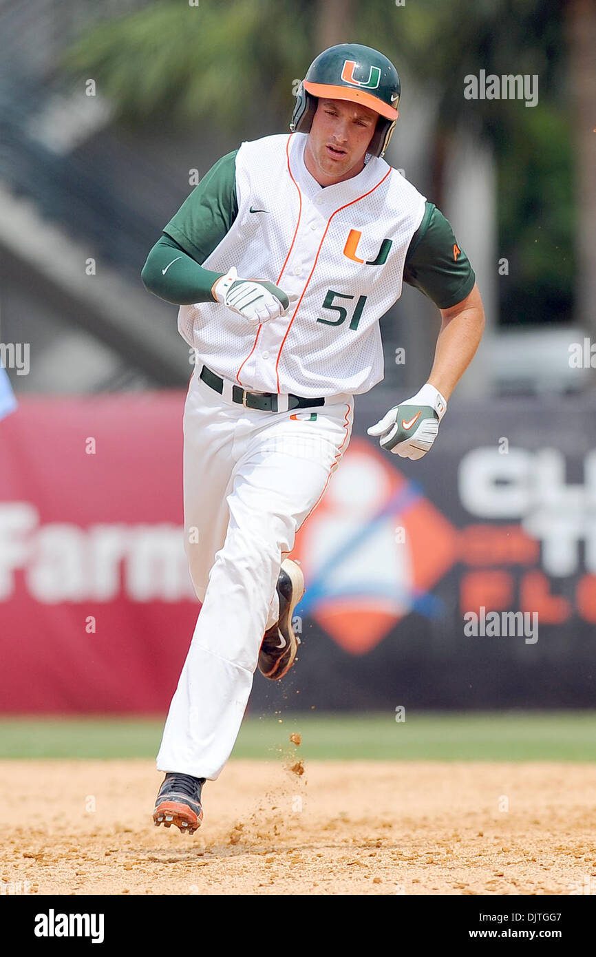 Miami Hurricanes 1B Ryan Perry (51) circles the bases after his homerun ...