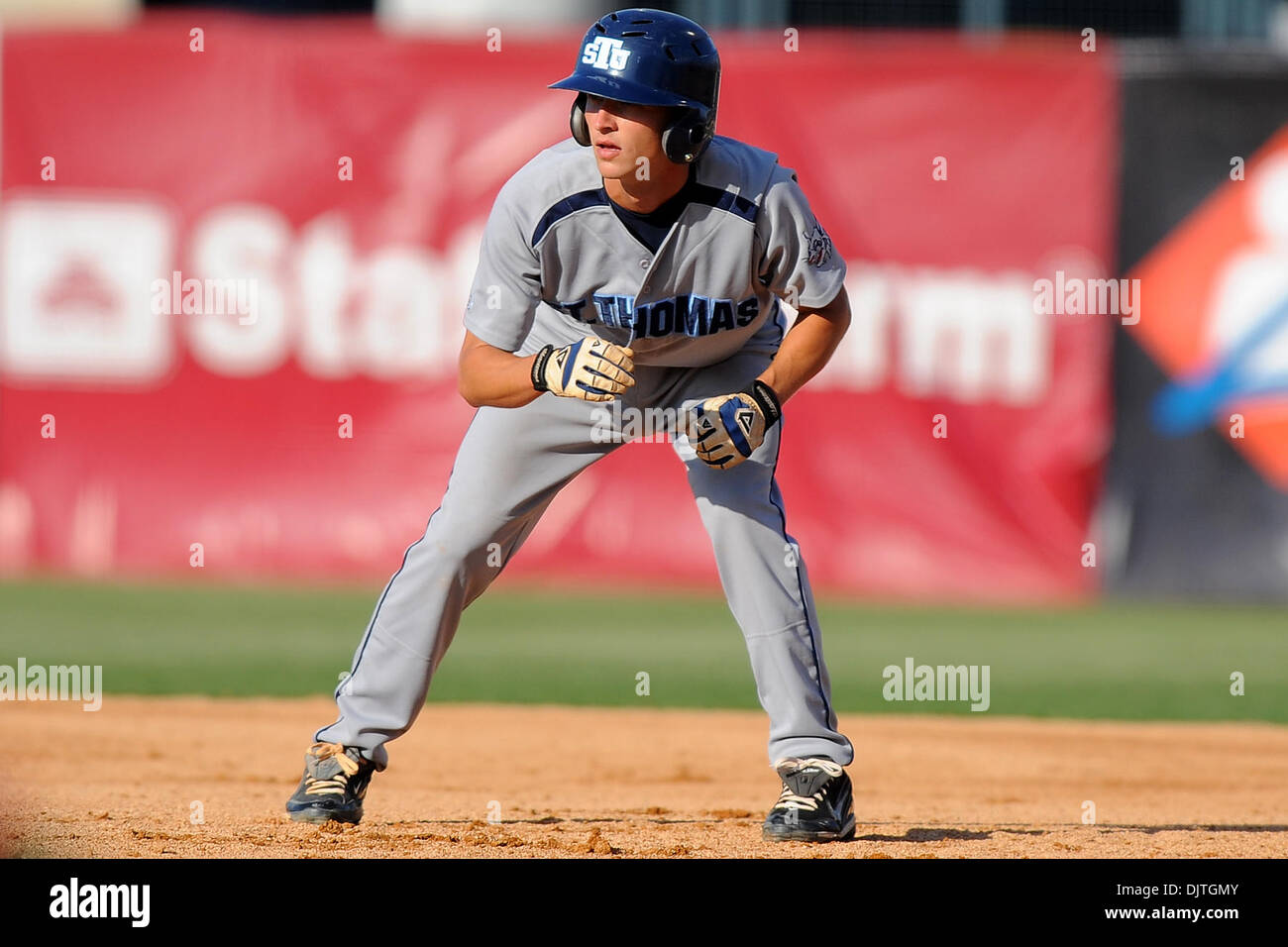 St. Thomas University Bobcats INF Lance Larimer (7) takes a lead off ...