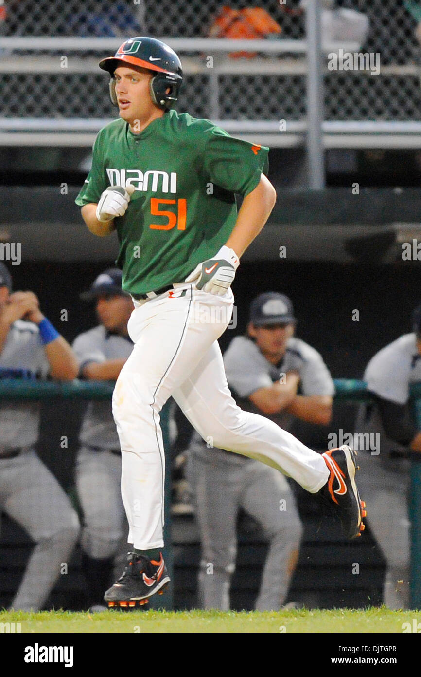 Miami Hurricanes 1B Ryan Perry (51) heads home after hitting homerun ...