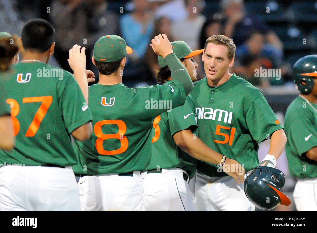 Miami Hurricanes 1B Ryan Perry (51) receives congratulations after ...