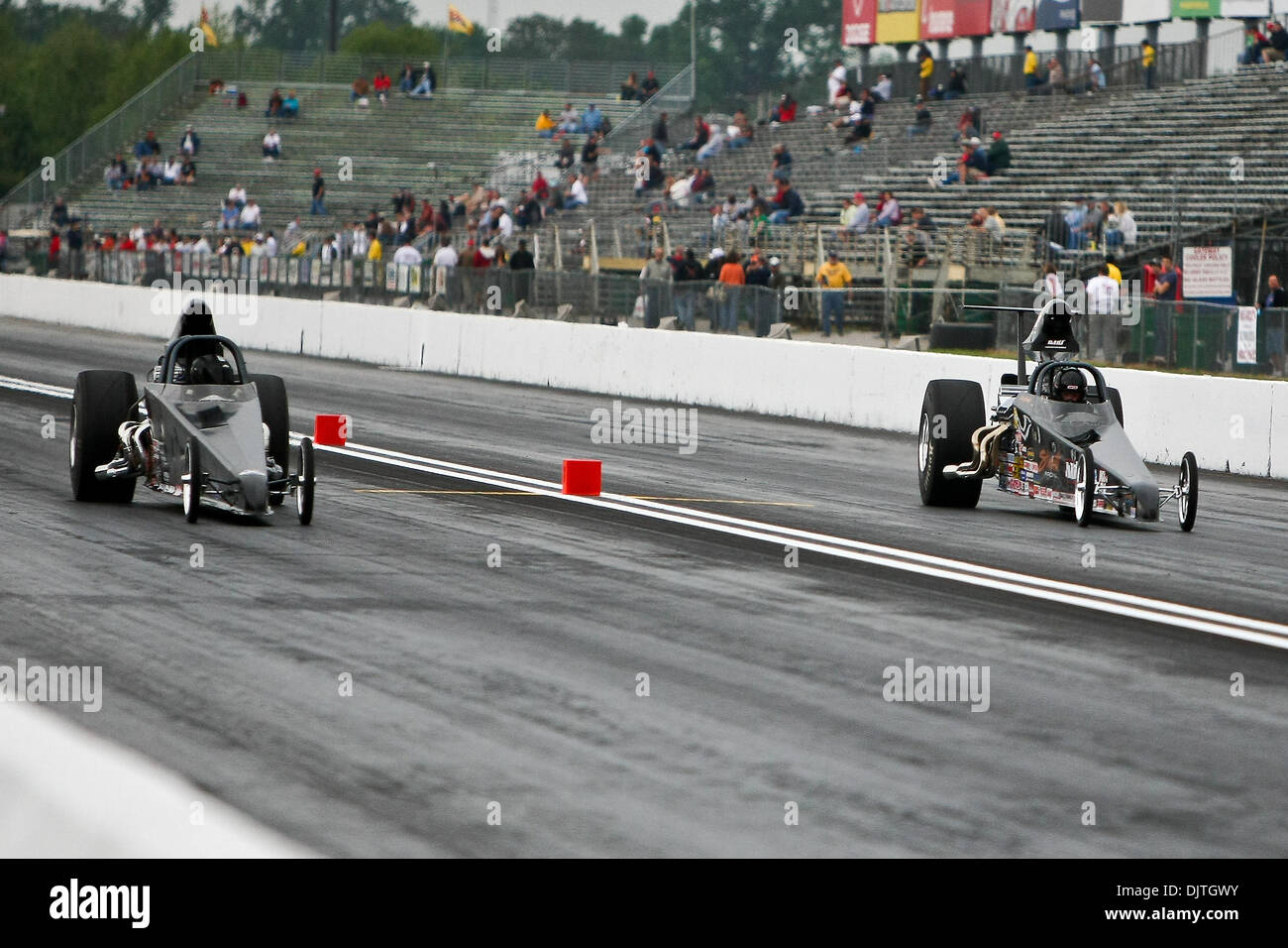 30 April 2010: Two super comp dragsters head for the finish line on day ...