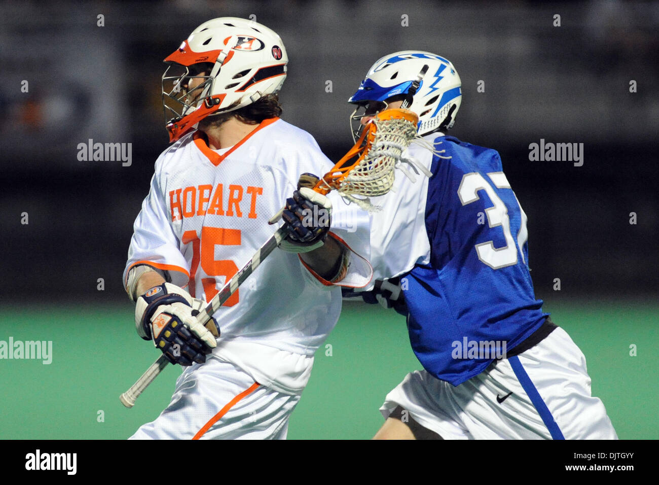 1 May 20010: Hobart junior mid-fielder Tim Bigelow (15) gets past the ...
