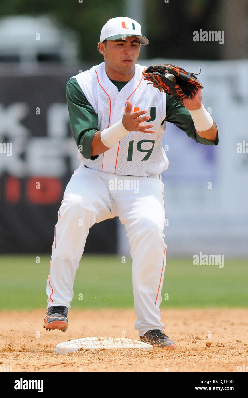 Miami Hurricanes 2B Frankie Ratcliff (19) prepares to turn a double ...