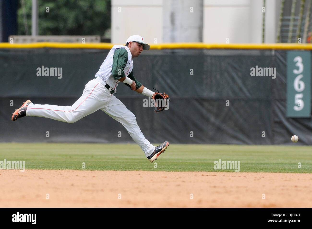 Miami Hurricanes 2B Frankie Ratcliff (19) can't reach base hit..The ...