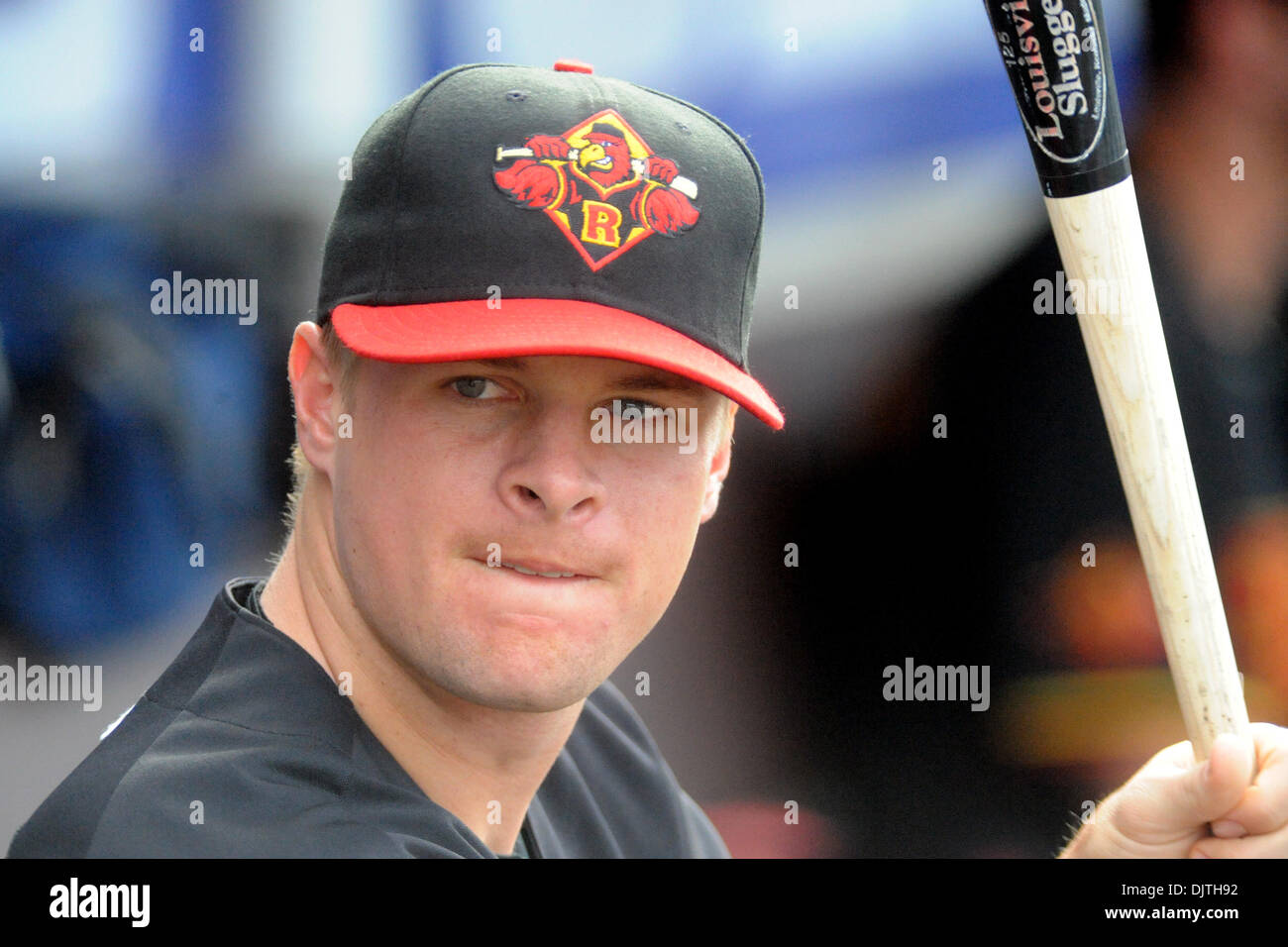 Rochester second baseman Matt Tolbert (4) practices his swing while in ...