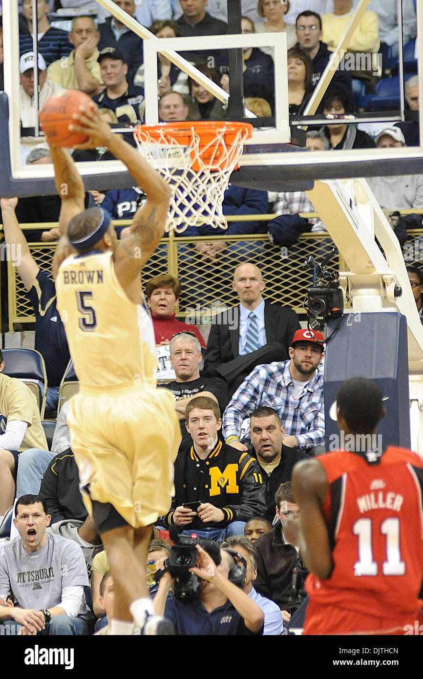 Pitt's #5 Gilbert Brown goes up for a dunk against Rutgers at Petersen ...