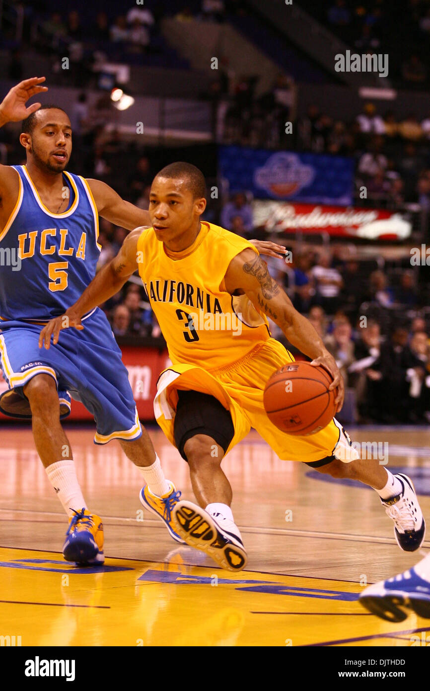 California point guard drives to the basket, during the first half of ...