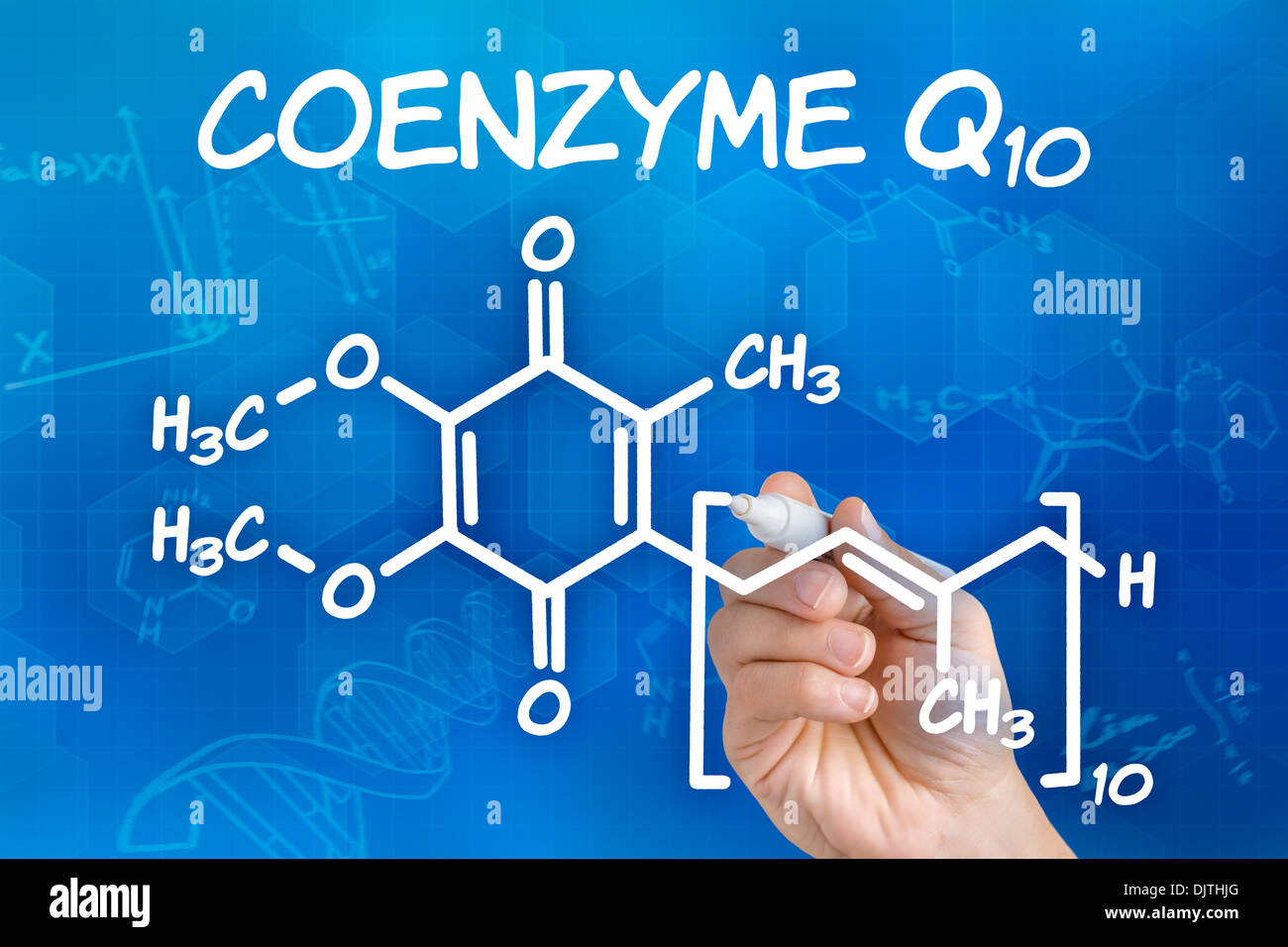 Hand with pen drawing the chemical formula of coenzyme Q10 Stock Photo ...