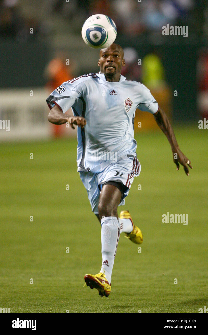Colorado Rapids Forward Omar Cummings tracks down a long kick that ...